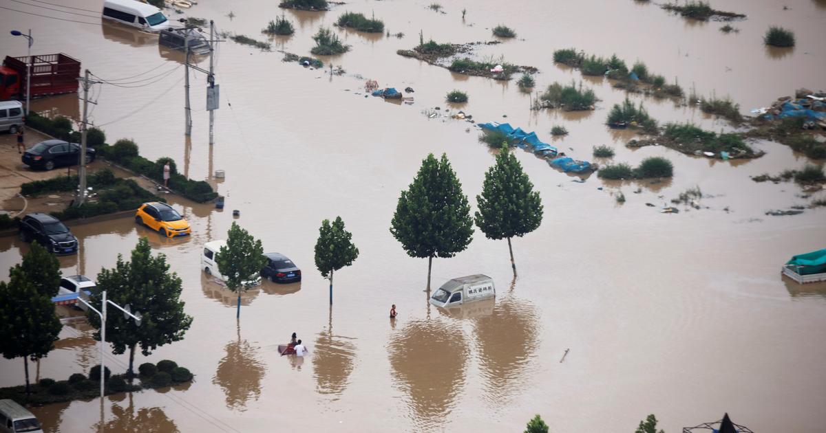 En images : scènes de chaos en Chine après des inondations dévastatrices