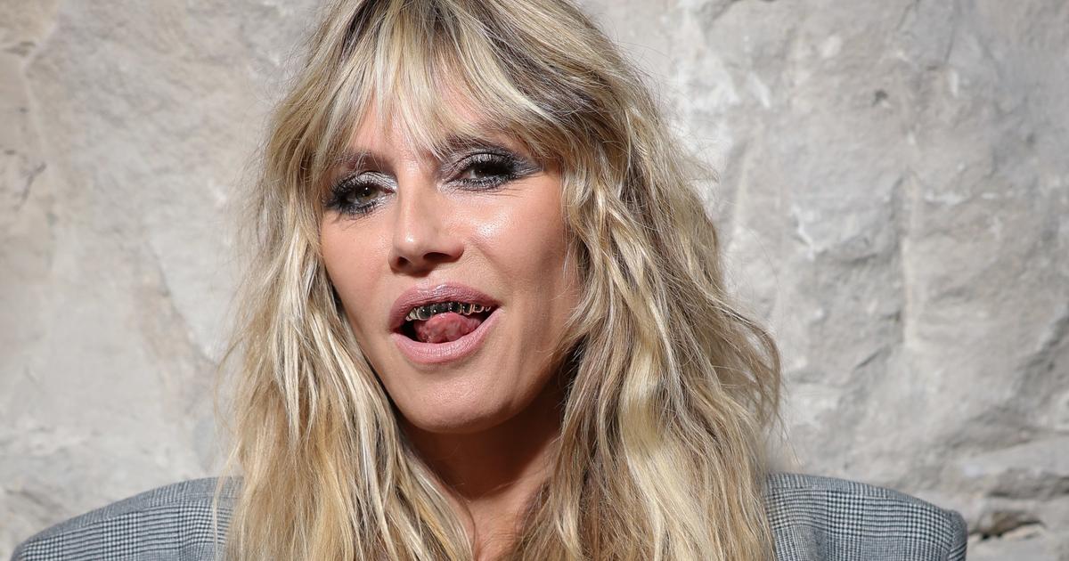 Dents argentées et robe en dentelle transparente : le look étrange d ...
