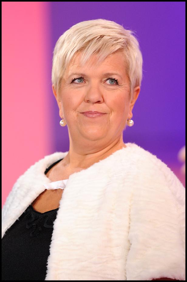 PHOTOS - Mimie Mathy : son évolution physique en images