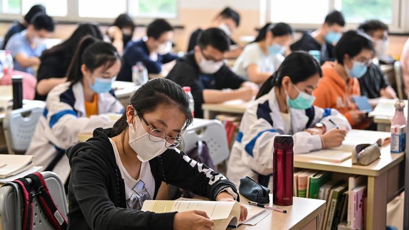 À Shanghai, les lycéens ont repris les cours en suivant des règles ...