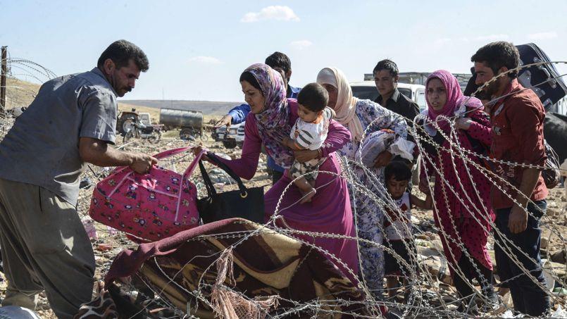 L'exode des Kurdes syriens fuyant l'Etat islamique