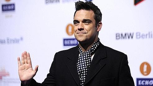 Robbie Williams réintègre le boys band Take That